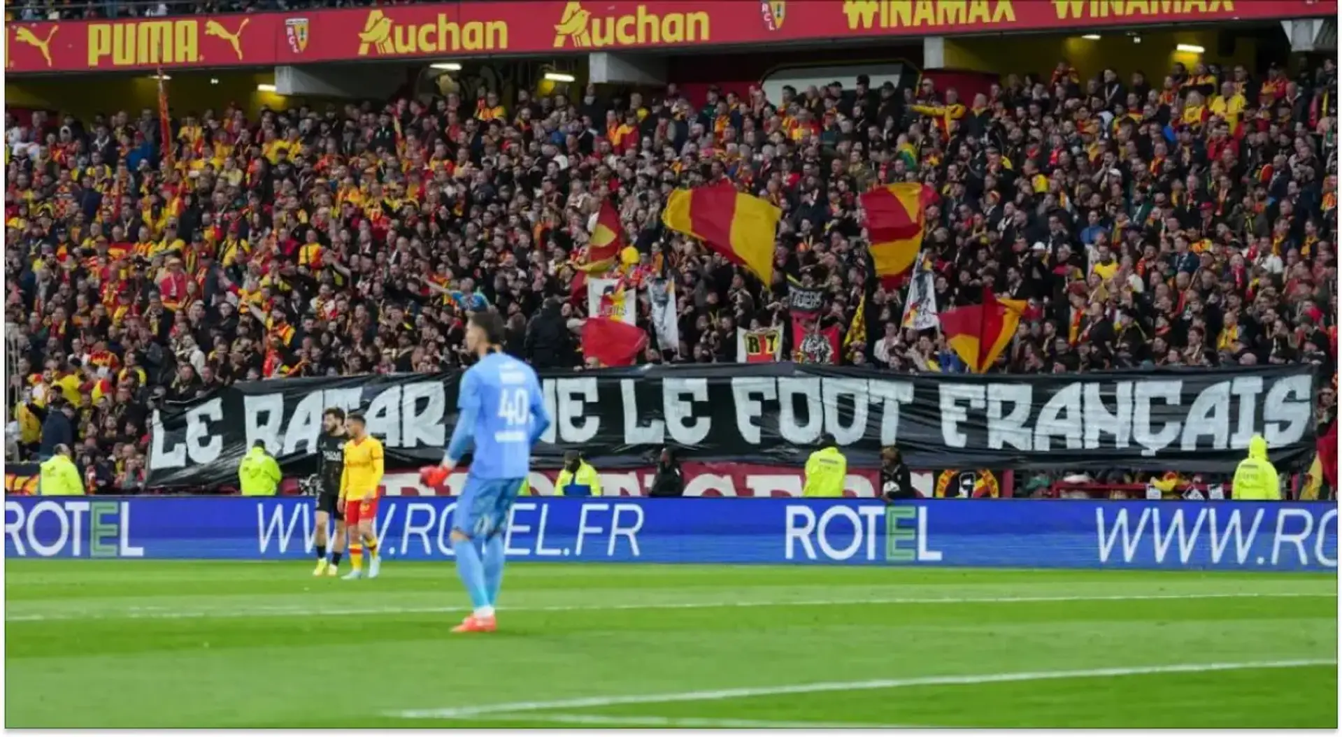 'Qatar kills French football': Lens fans display protest banners during ...