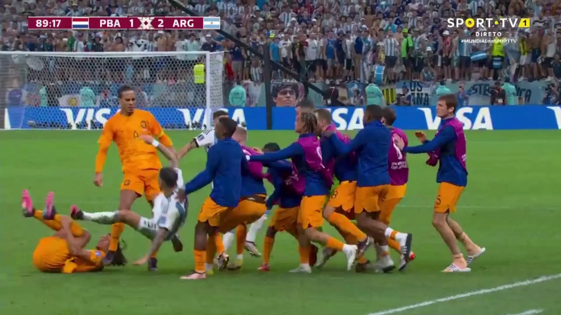 Van Dijk sends Leandro Paredes flying after Argentina player smashes ...