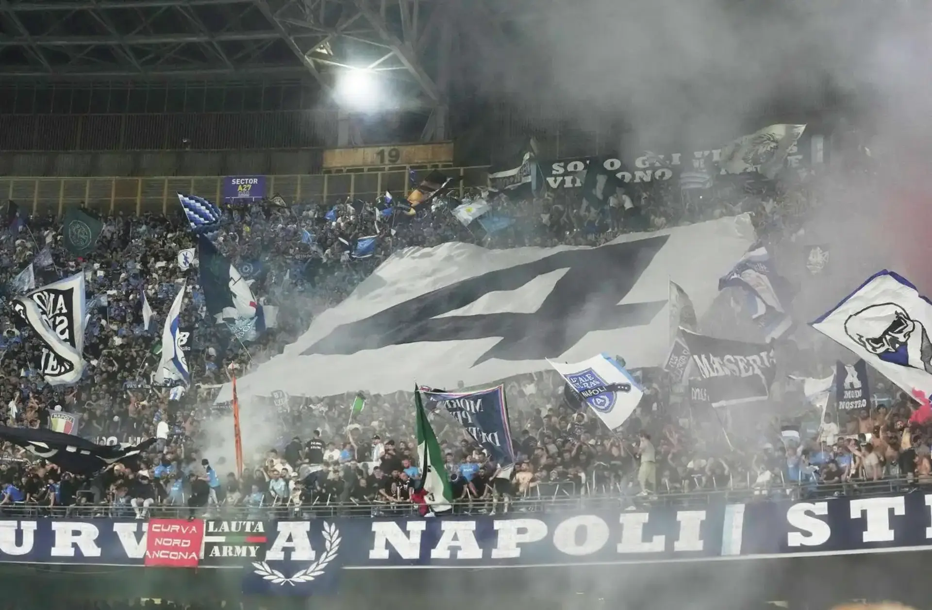 Napoli fans display banner showing Conte holding dog on leash with ...