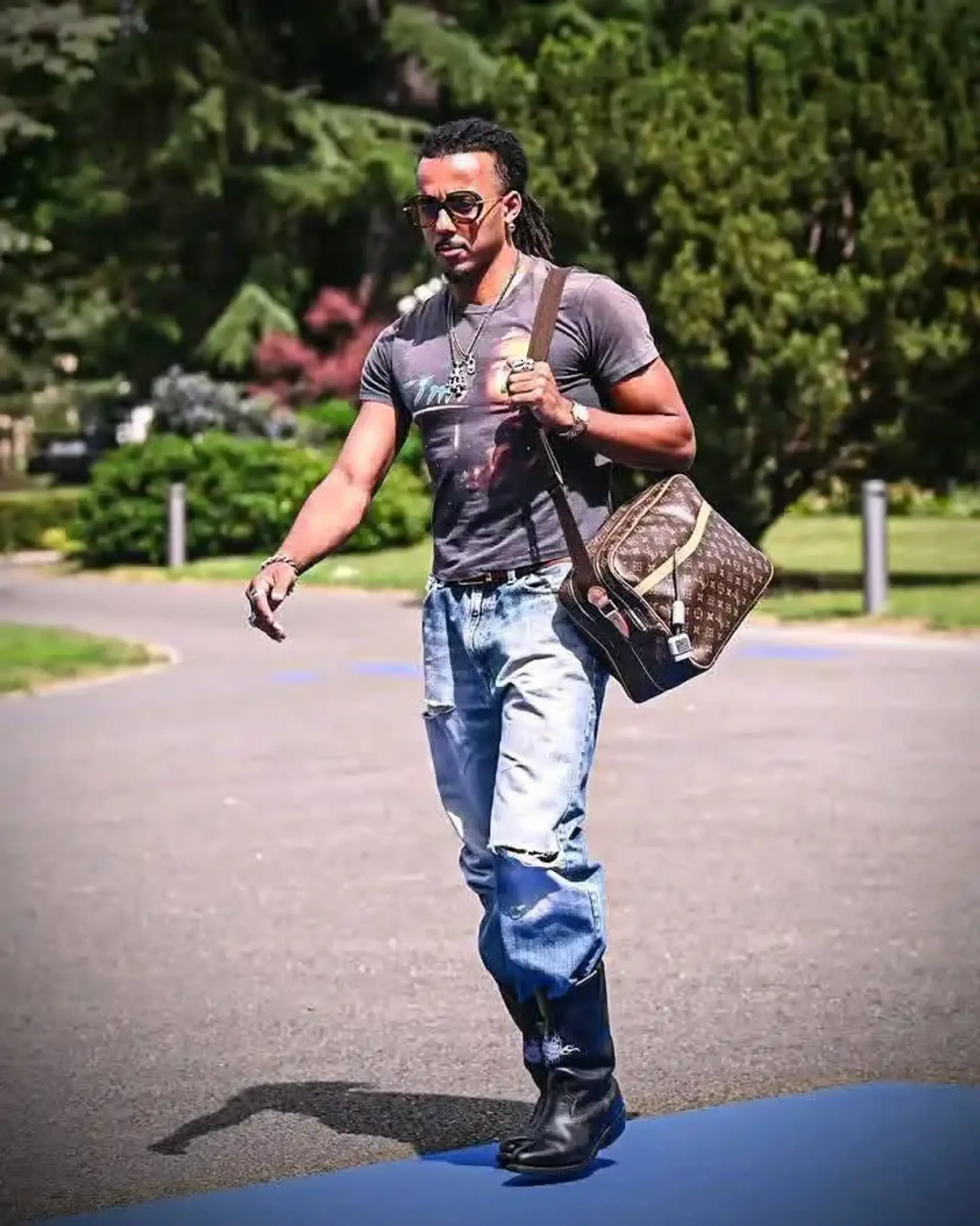 Drip king: Jules Kounde turns heads on arrival at France camp with eye ...