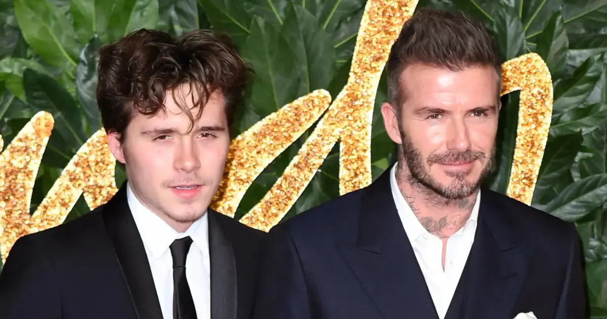 Brooklyn Beckham covers tattoo dedicated to his father David as family ...
