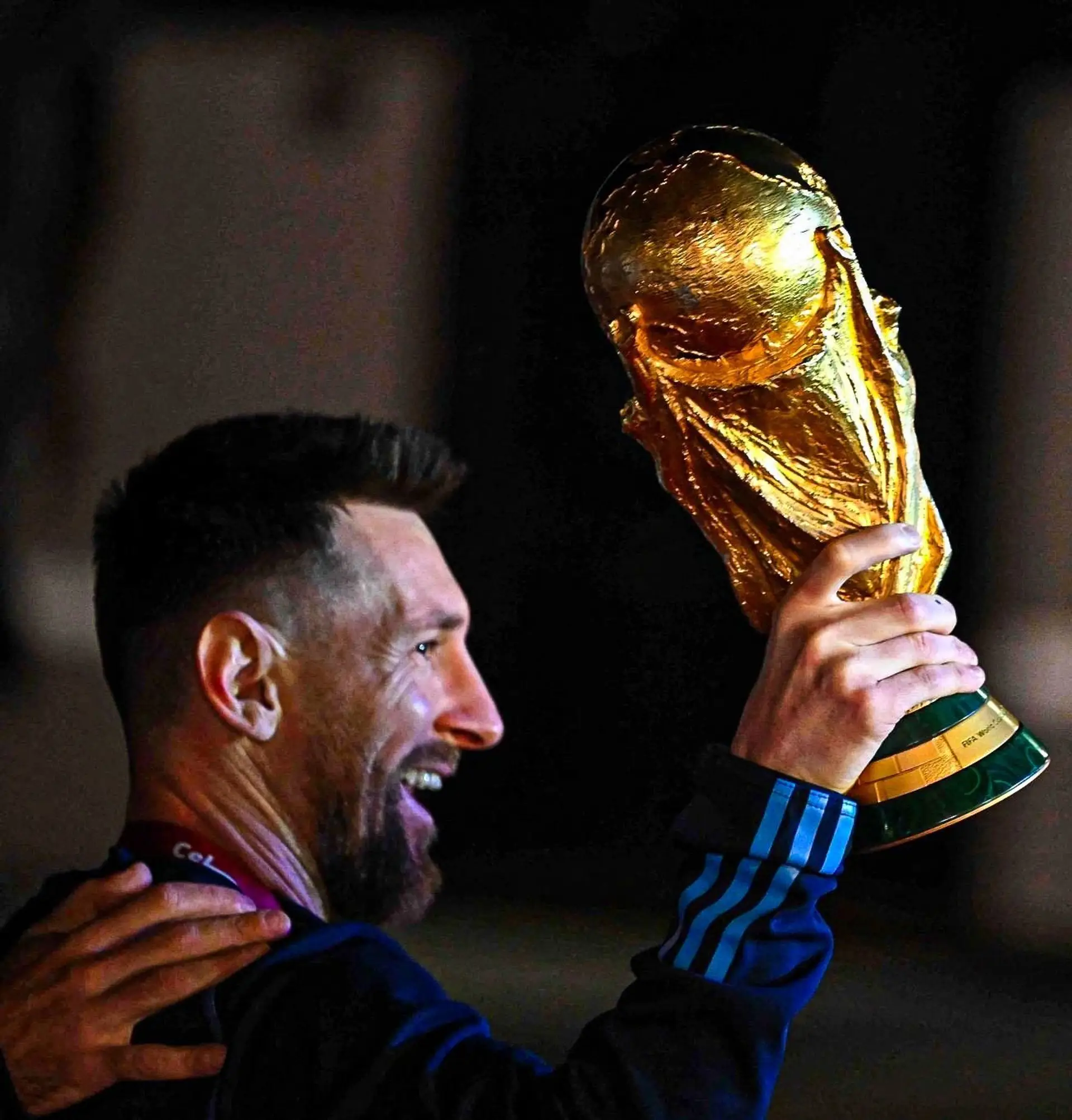 First pics as Messi arrives in Argentina with World Cup trophy